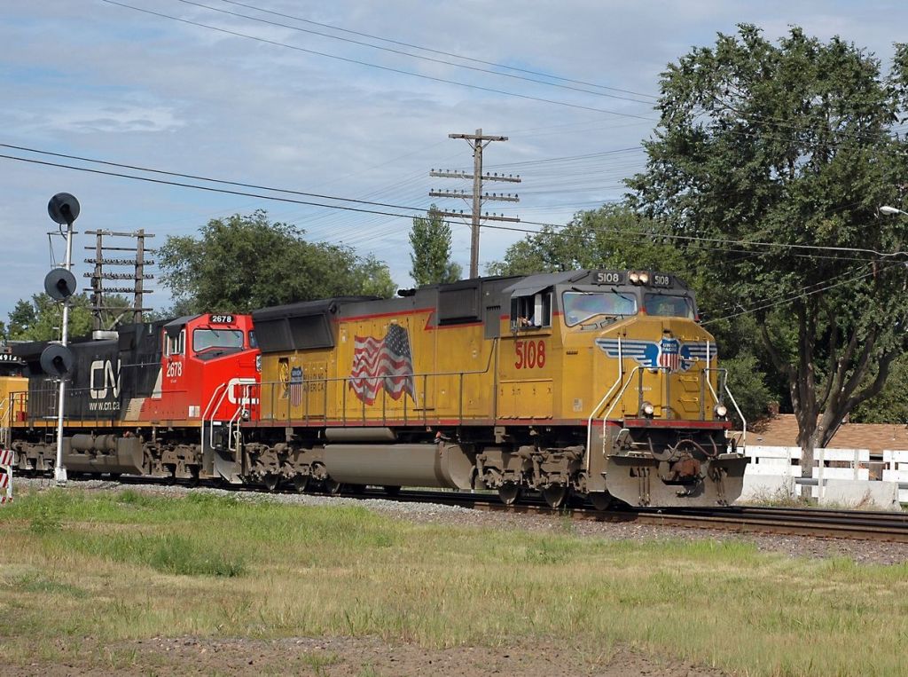 The trailing loco is a long way from home.
